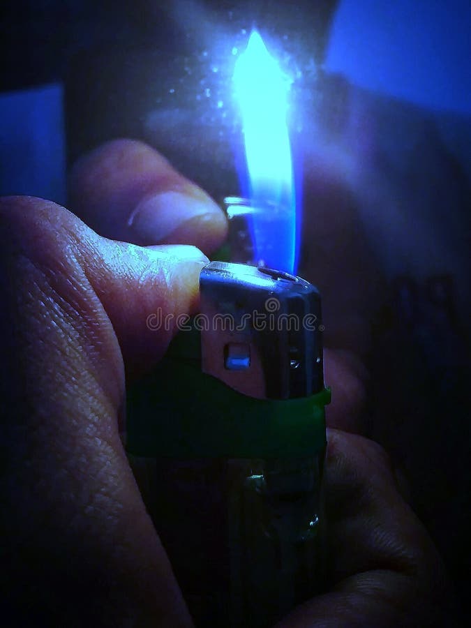 Fire light from lighter stock image. Image of fire, lighter - 159866021