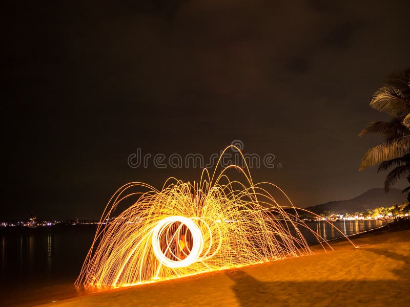 Fire Light Source Painting in the Sea Shore Stock Image - Image of burn ...