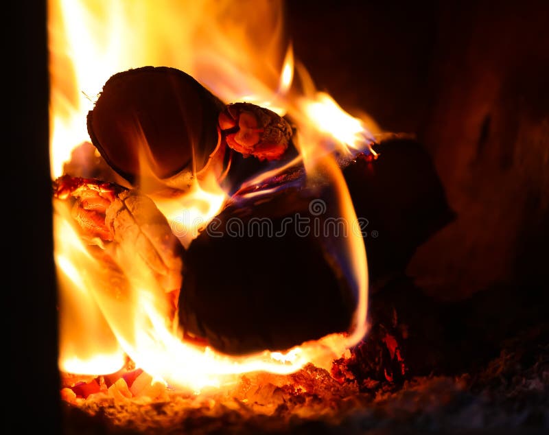 Fire Lit in the Wood Stove with the Flames Burning the Wood Logs Stock ...