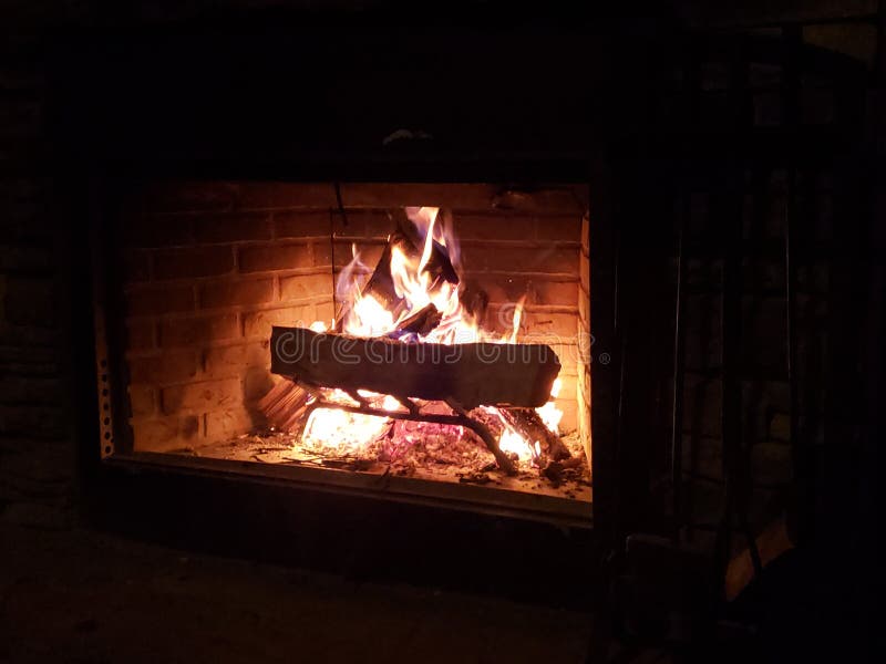 Fire Log Burning in a Fireplace Stock Image - Image of candle ...
