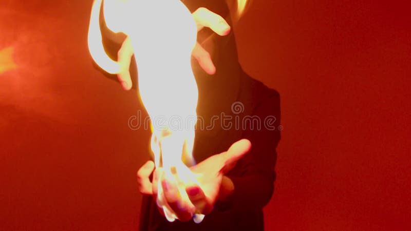 A Fire Mage in a Robe with a Large Hood, Holding His Hands Outstretched ...