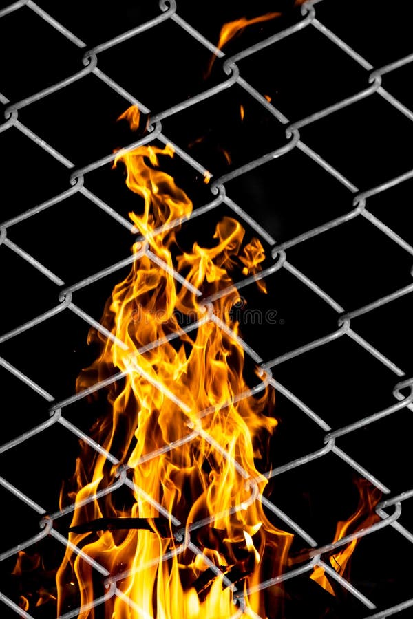 Fire in a metal grid stock image. Image of industry - 105263837
