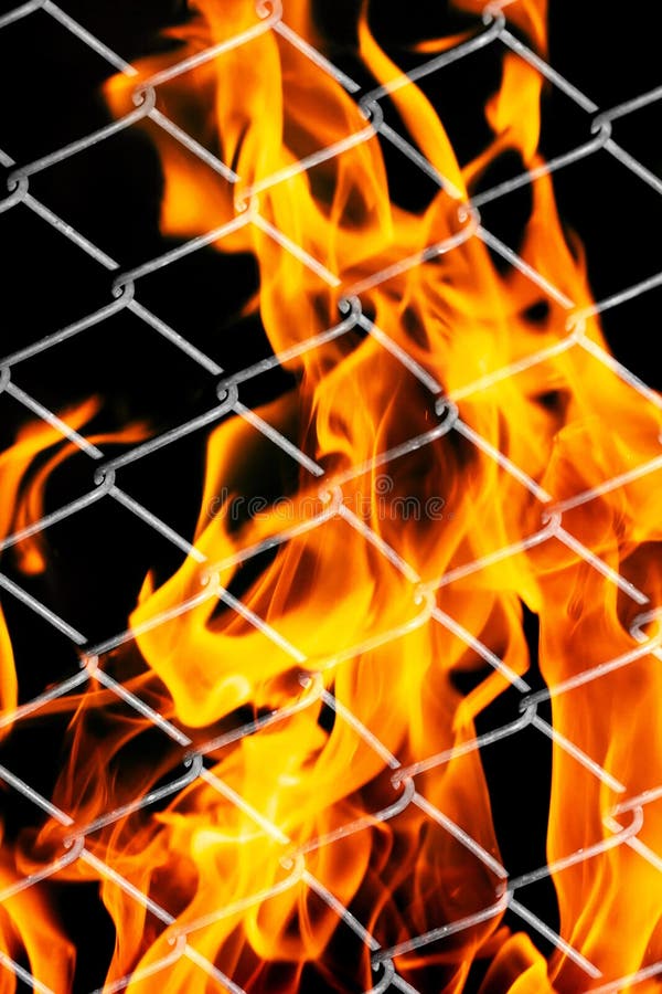 Fire in a metal grid stock image. Image of help, enclose - 105264459