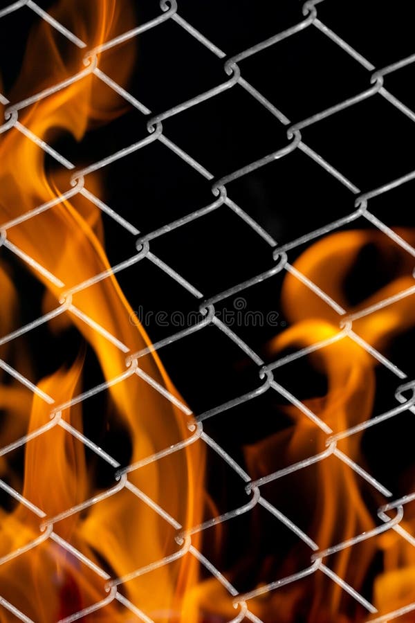 Fire in a metal grid stock image. Image of flamed, charcoal - 105264567