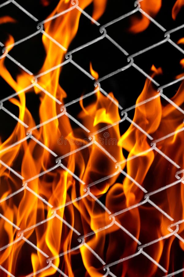 Fire in a metal grid stock image. Image of panel, fence - 105264609