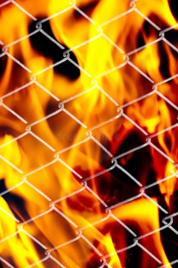 Fire in a metal grid stock photo. Image of industry - 105263724
