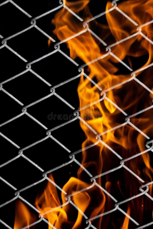 Fire in a metal grid stock image. Image of industry - 105264779