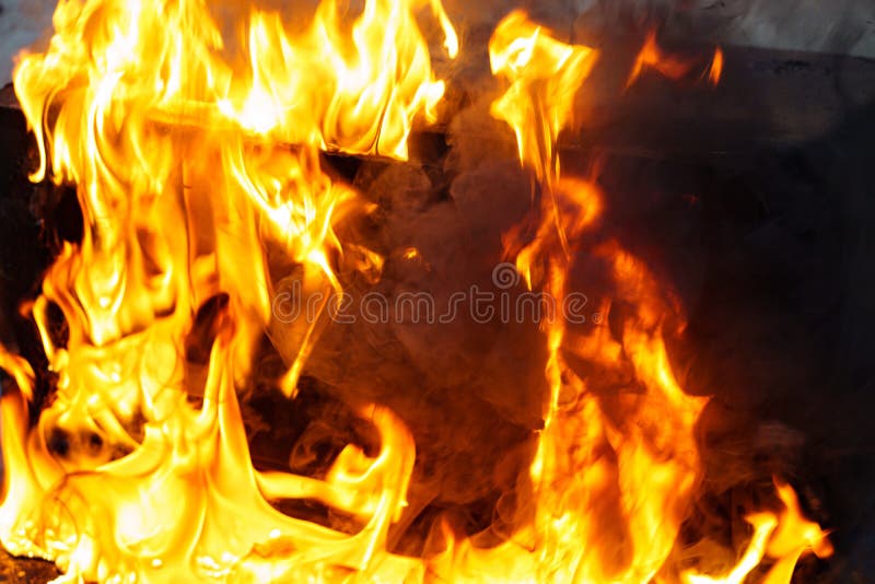 Fire and Molten Plastic on a Black Background. the Concept of Fire in ...