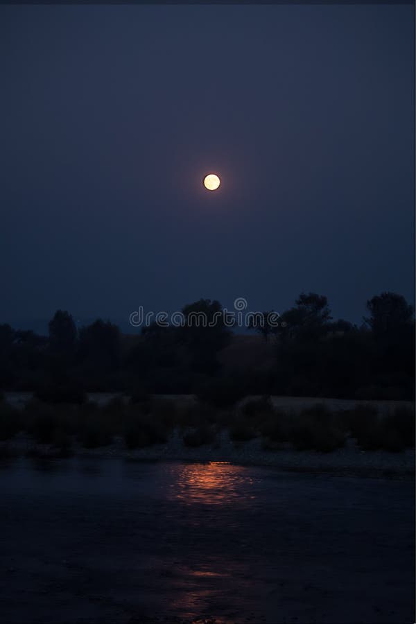 Fire Moon over Yuba River stock photo. Image of smoke - 125208098