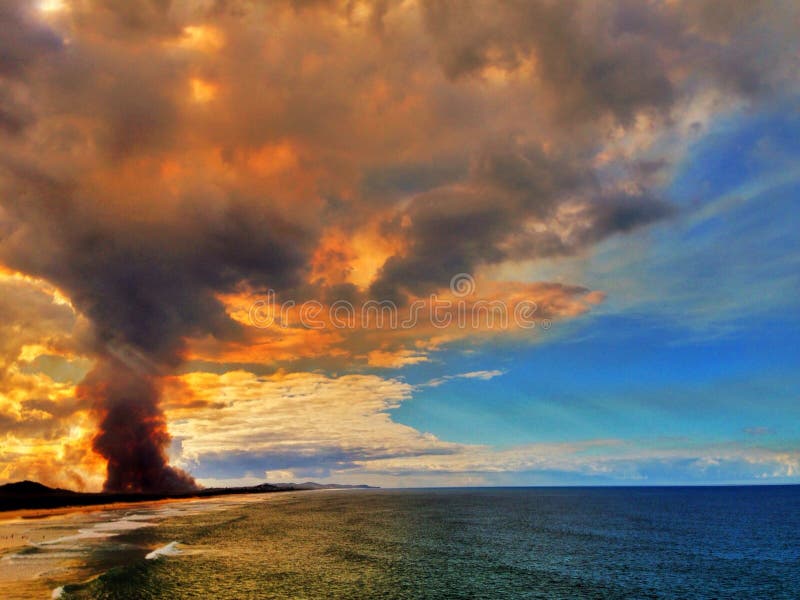 Fire next to the ocean stock image. Image of fire, blue - 56549289
