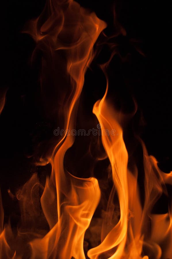 Burning Orange Flames on a Black Background Stock Image - Image of ...