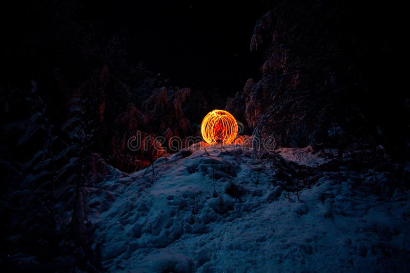 Fire Painting, Light Painting with Sparks at Winter Stock Photo - Image ...