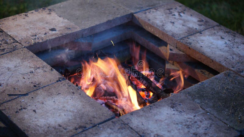 Fire Pit with burning fire stock image. Image of ashes - 81108673