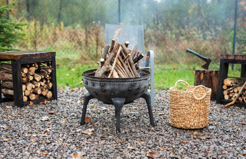 Fire Pit and Burning Fire in a Garden Stock Image - Image of iron ...