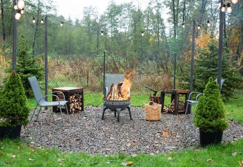 Fire Pit and Burning Fire in a Garden Stock Image - Image of black ...