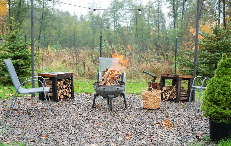 Fire Pit and Burning Fire in a Garden Stock Image - Image of outside ...