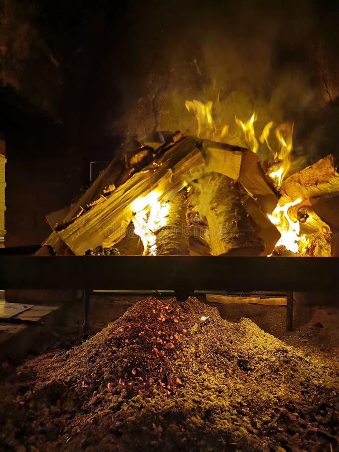 Fire pit at night stock image. Image of fire, heating - 239148383