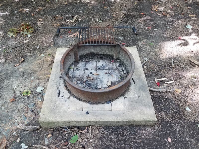 Fire Pit or Barbecue Grill on Cement Stock Photo - Image of rusty ...