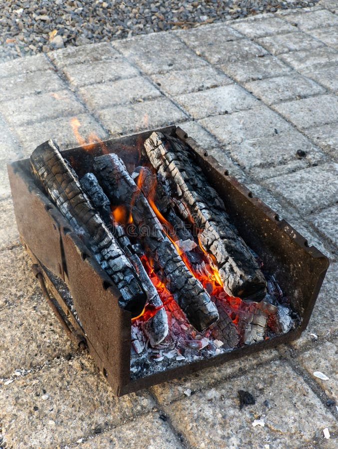 A Fire Pit with a Lot of Wood Burning in it Stock Image - Image of open ...