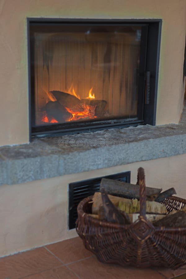 Fire place in living room stock image. Image of flame - 79983493