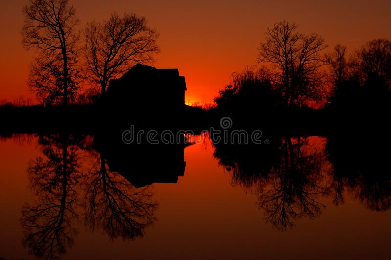 Fire on the pond stock photo. Image of silhoutte, lake - 3028426