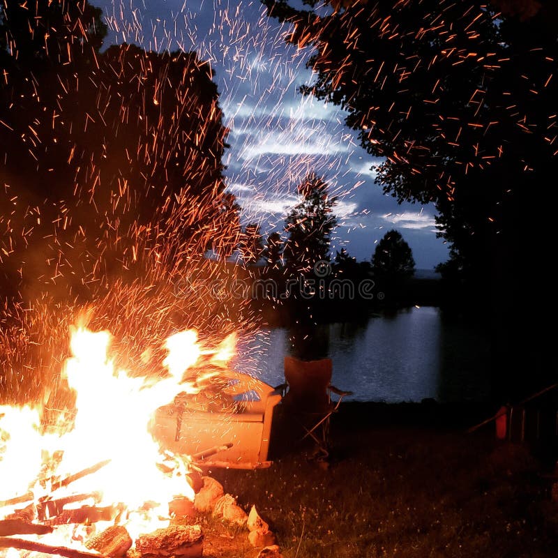 Fire on the pond stock photo. Image of silhoutte, lake - 3028426