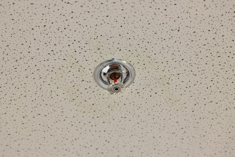 Fire Protection. Fire Sprinkler Head on White Ceiling in the Building ...