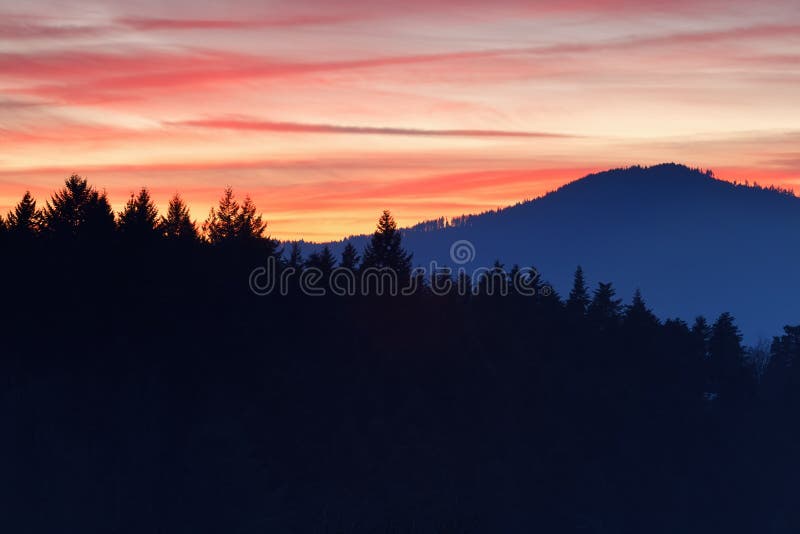 Fire Red Sunset Over Mountains Stock Photo - Image of outdoors, purple ...