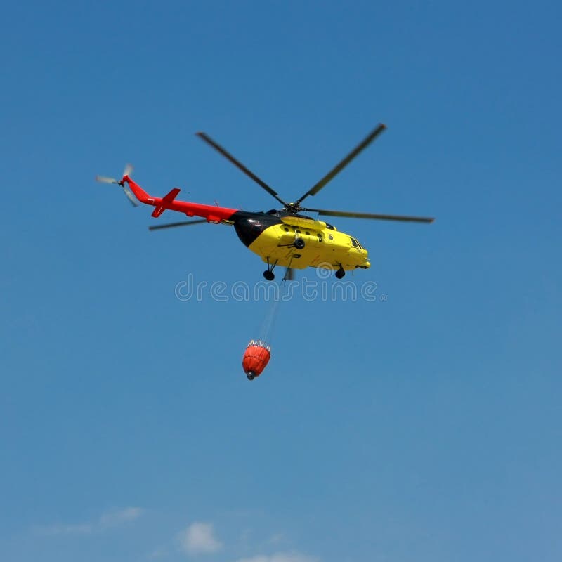 Fire Rescue Helicopter with Water Bucket - Square Stock Photo - Image ...