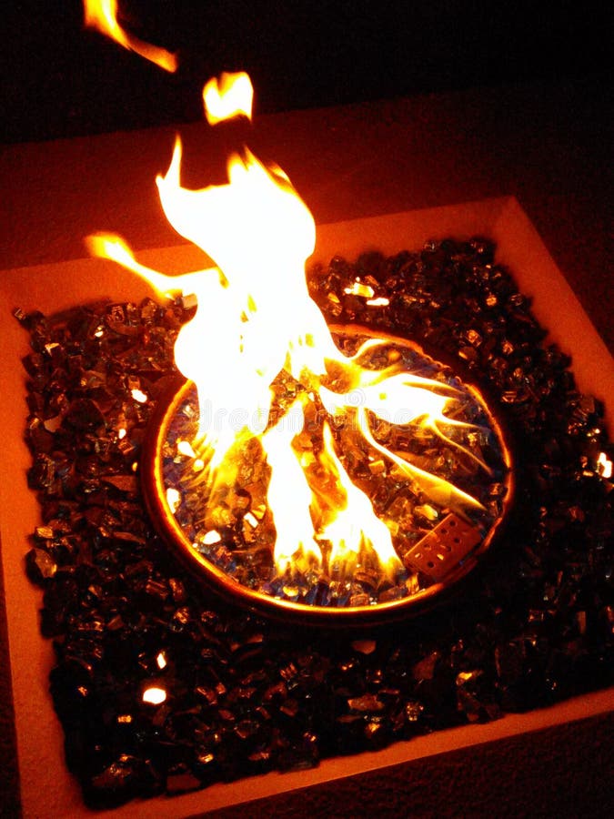 Fire on the rocks stock image. Image of rocks, fire, blue - 80786529