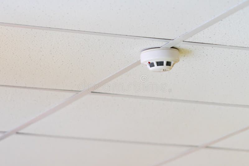 Fire Sensor. the Sensor is Mounted on the Ceiling in the Office Space ...
