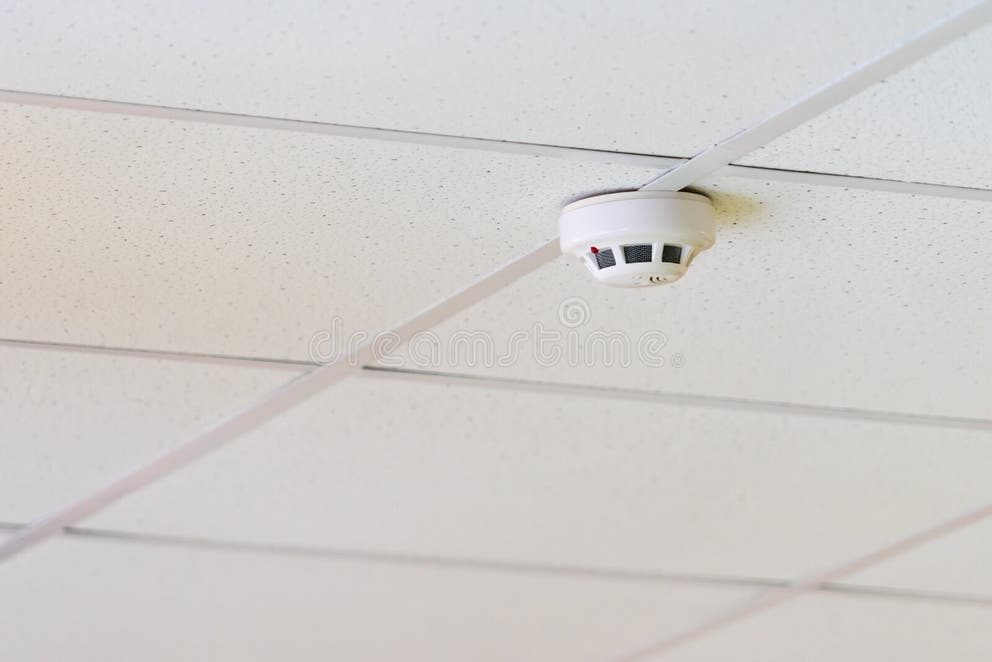 Fire Sensor. the Sensor is Mounted on the Ceiling in the Office Space ...