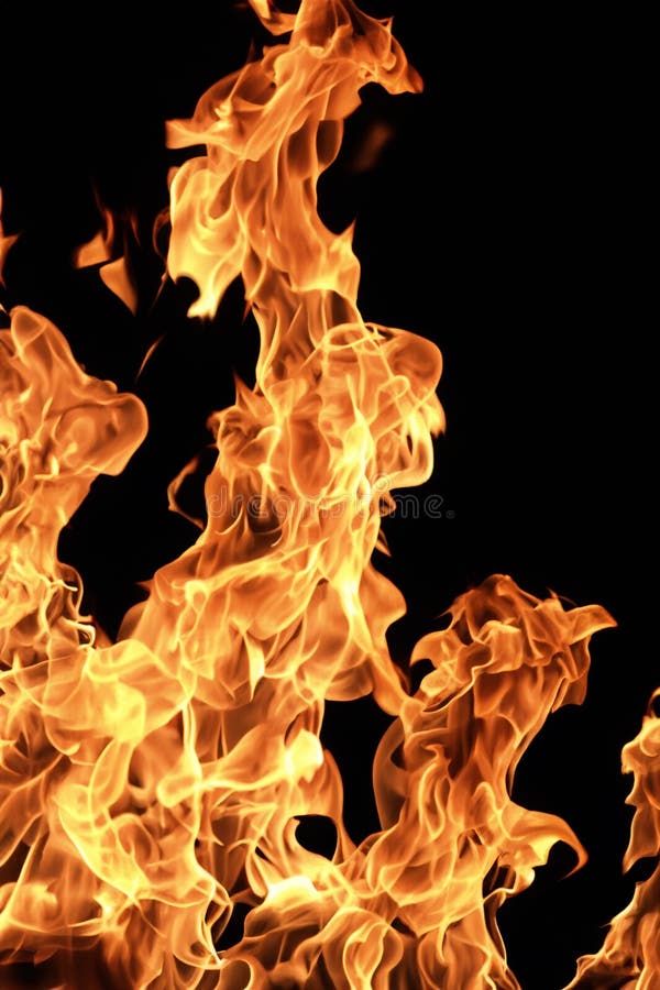 Fire and Shadows: Flames Illuminating Darkness Stock Photo - Image of ...