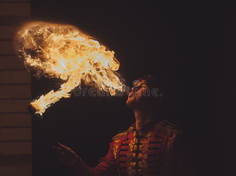 Fire Show Artist Breathe Fire in the Dark Stock Photo - Image of ...