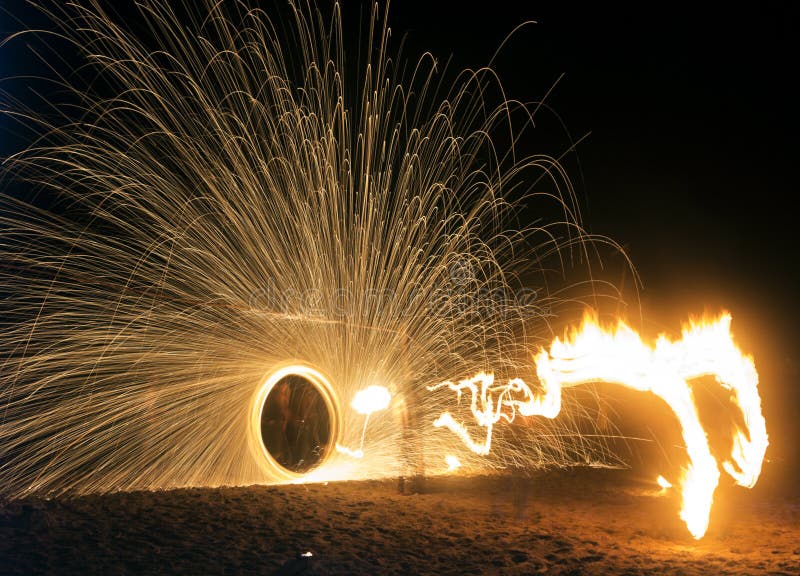 Fire show on the beach stock image. Image of flaming - 61183399