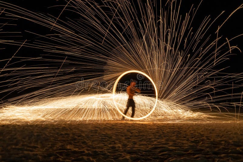 Fire Show on the Beach in Thailand. Man Juggling with Fire Stock Image ...