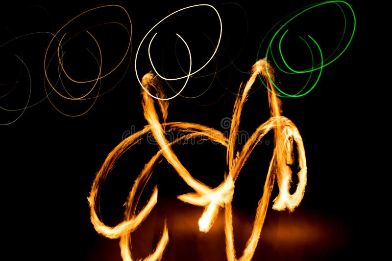 Fire Show Fiery Motion. Night Performance Abstract Drawing. Stock Photo ...