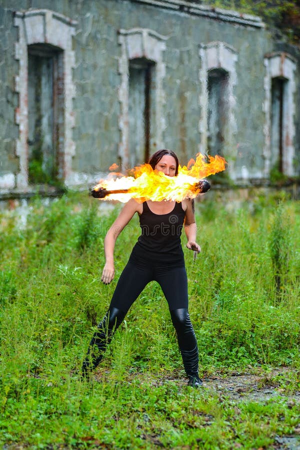 Fire Show Girl with Flaming Torches Stock Photo - Image of exposure ...