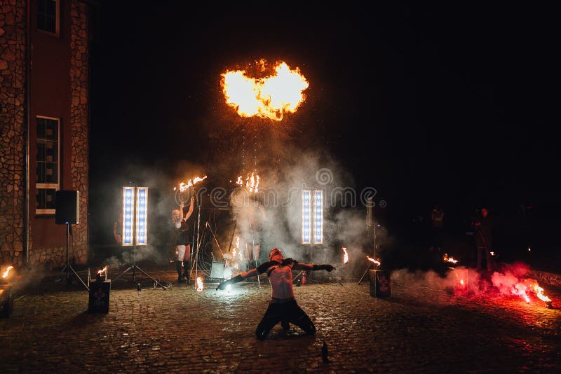 Man Spits Fire on the End of the Wedding Party Stock Image - Image of ...