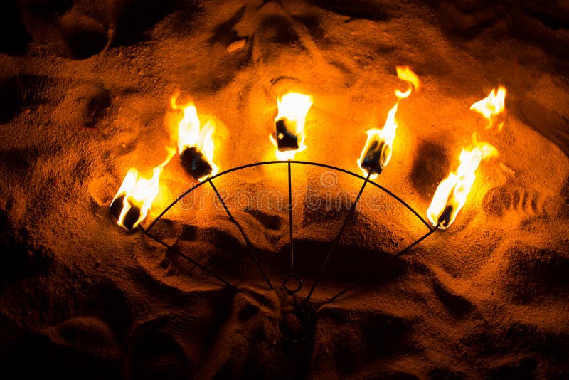 Fire Show Fire Movement. Fan of Fire on the Sand. Stock Photo - Image ...