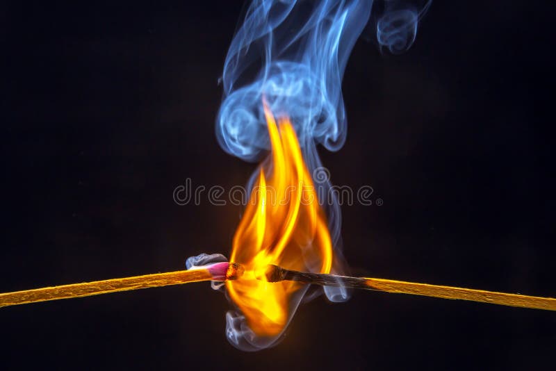 Smoking Match on a Black Background. Heat and Light from Fire Flame ...