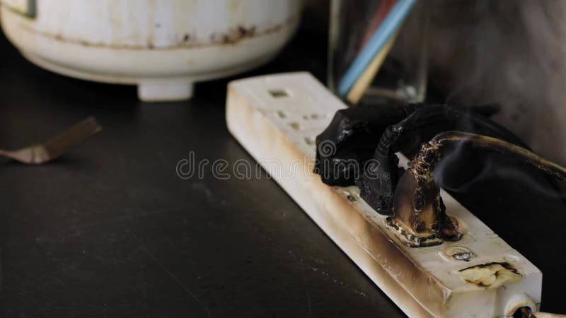 Fire and Smoke from Plugging the Power Cord into an Overloaded ...