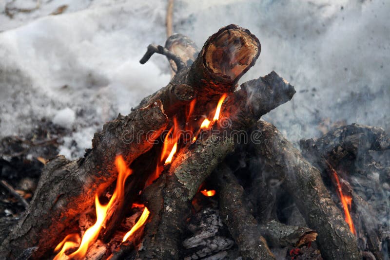 The fire on the snow stock photo. Image of fireplace - 174773262