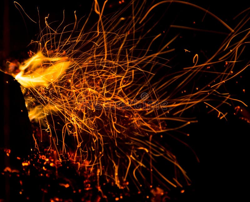 Fire with Sparks on a Black Background Stock Image - Image of bright ...