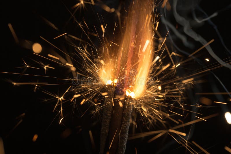 Fire and sparks close up stock photo. Image of macro - 247563784