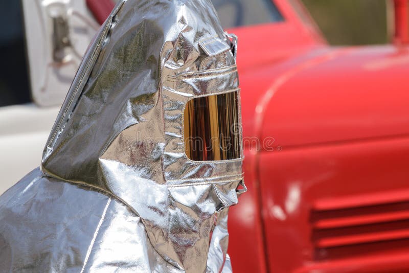 Heat Suit with with Headgear with Dark Visor Stock Photo - Image of ...