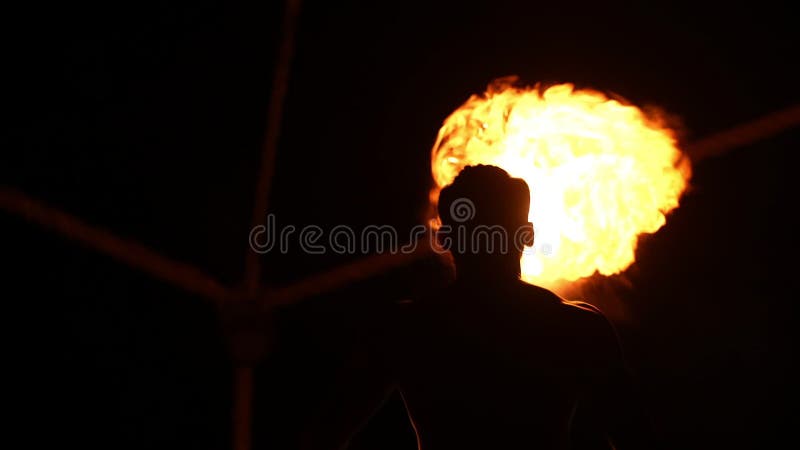 Fire spitter in the night stock footage. Video of light - 298555422
