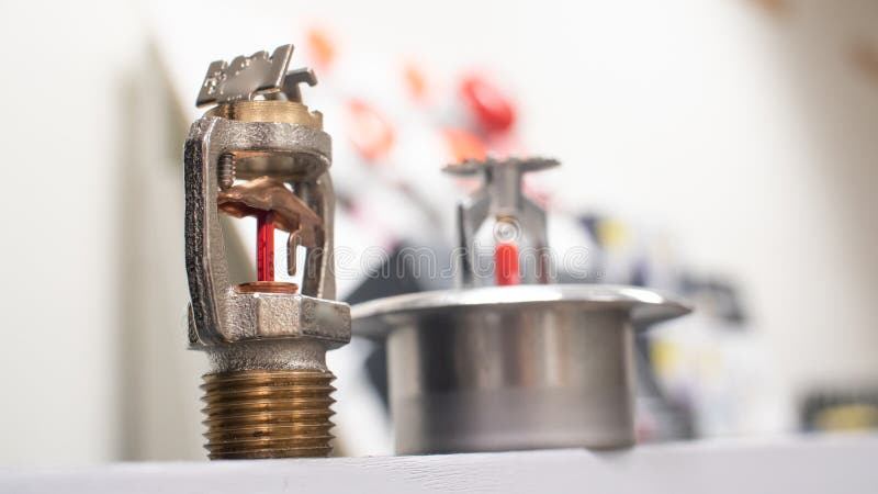 Fire Sprinkler Heads with Fusible Links and Frangible Bulbs Stock Image ... Fire Sprinkler Heads with Fusible Links and Frangible Bulbs Stock Image ...