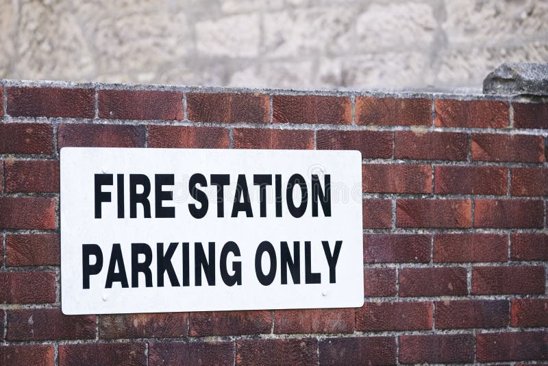 Fire Station Parking only on Wall Car Park Sign Stock Image - Image of ...