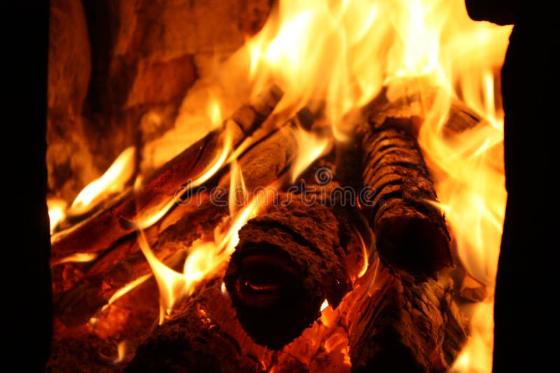 Fire in the Stove in a Rustic House. Wood Heating. Stock Image - Image ...